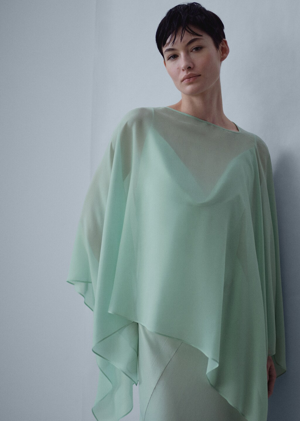 Asymmetric semi-transparent cape - Women | MANGO OUTLET Romania