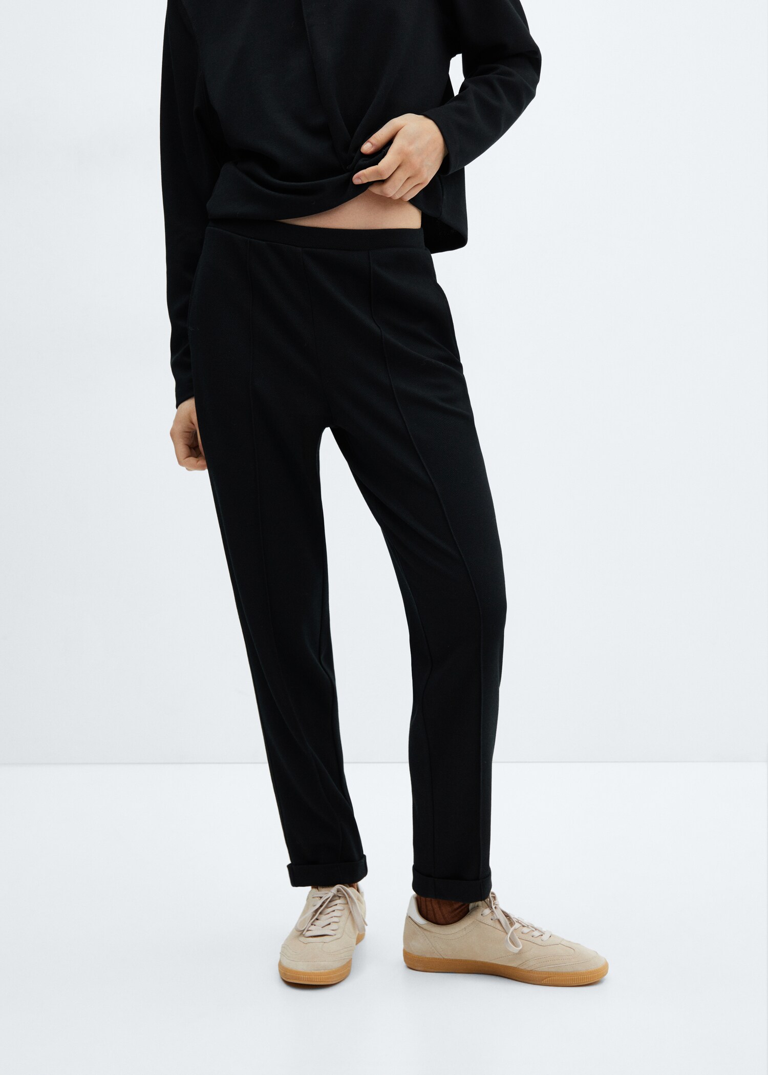 Jogger pants with seam detail - Women | MANGO OUTLET USA